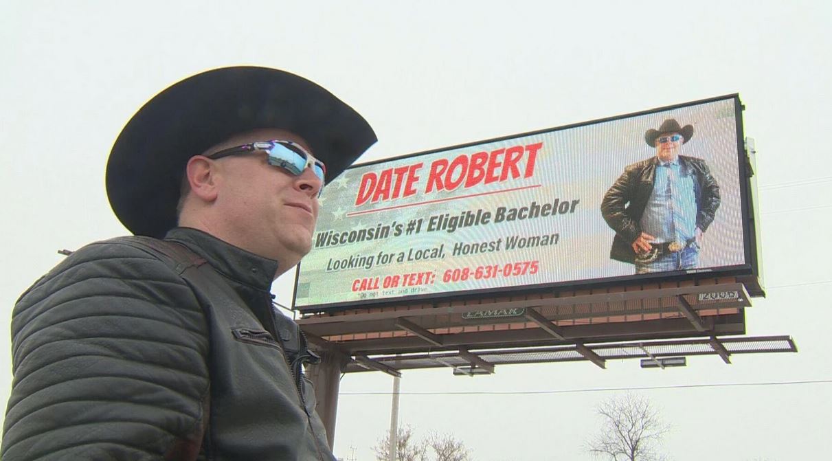 WISCONSIN MAN TRIES BILLBOARD TO FIND A WIFE - KQ98